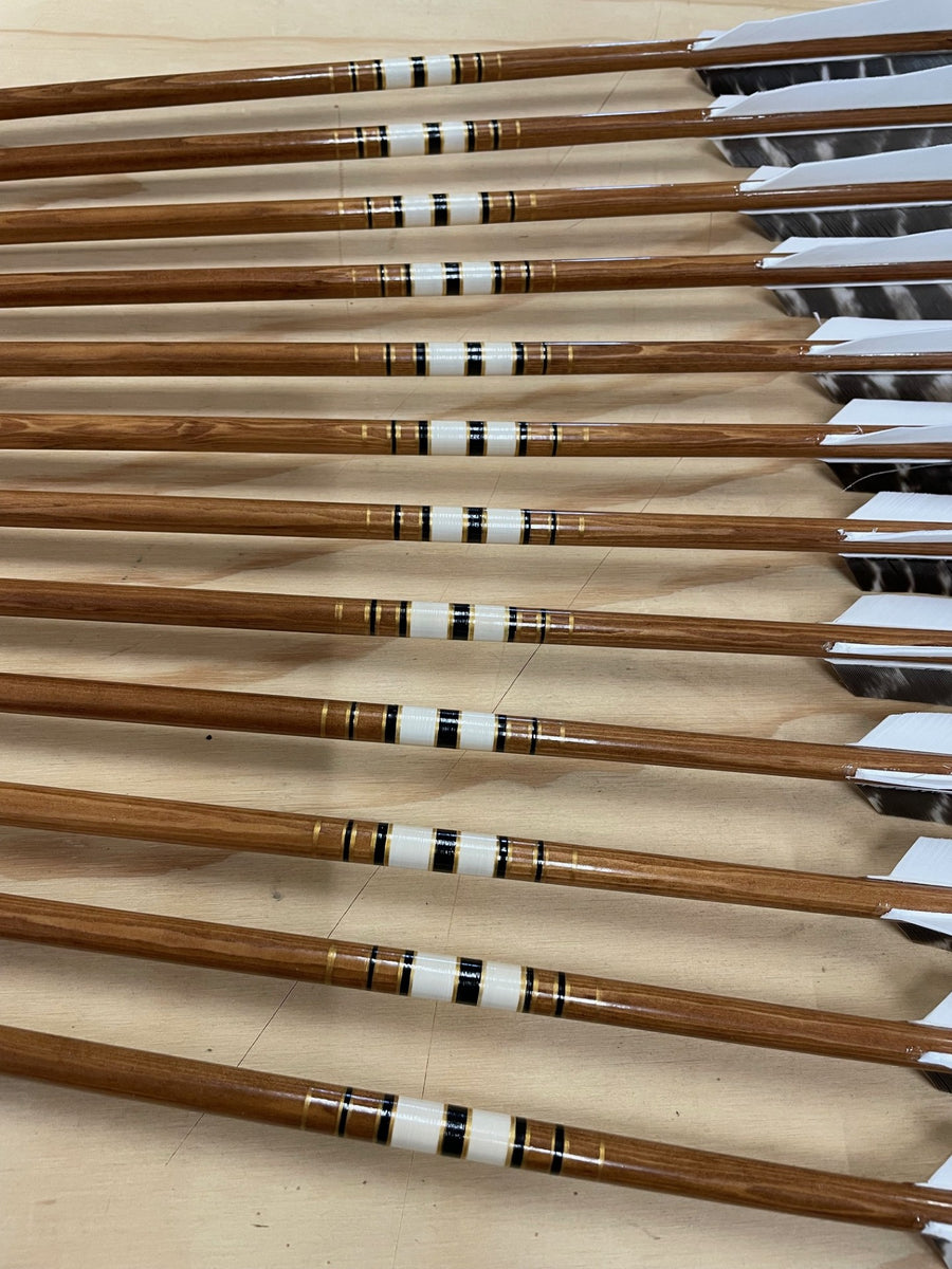 50-55# Eagle tapered arrows, Sitka Spruce, Brown stain with white cres ...